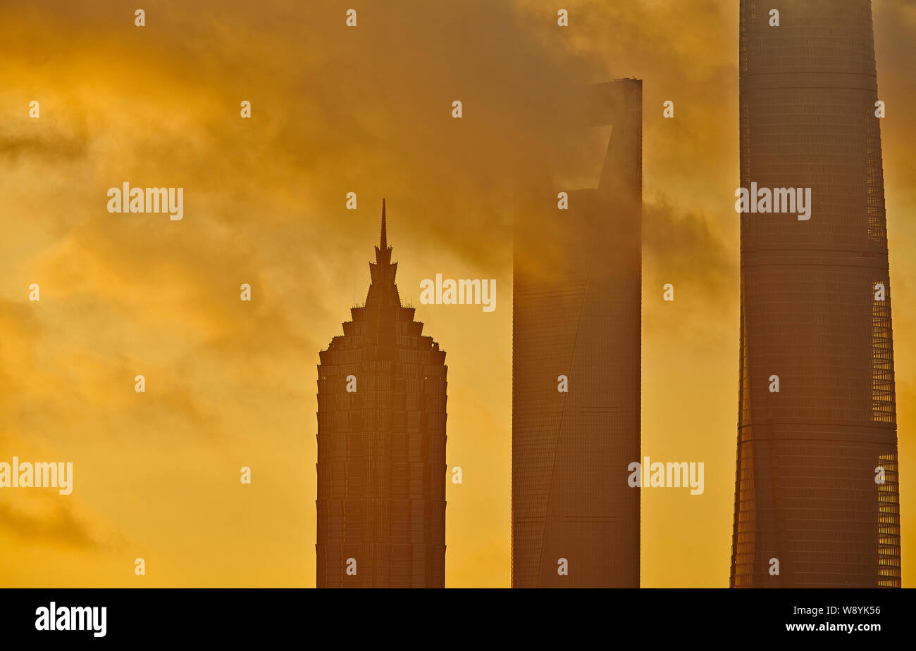 --FILE--View at sunrise of (from left) Jinmao Tower, the Shanghai World ...