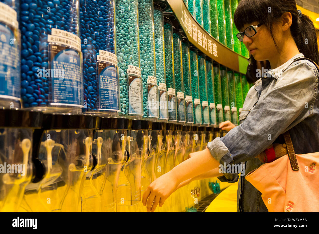 Customers buy chocolate candies at the flagship store of M&Ms in ...