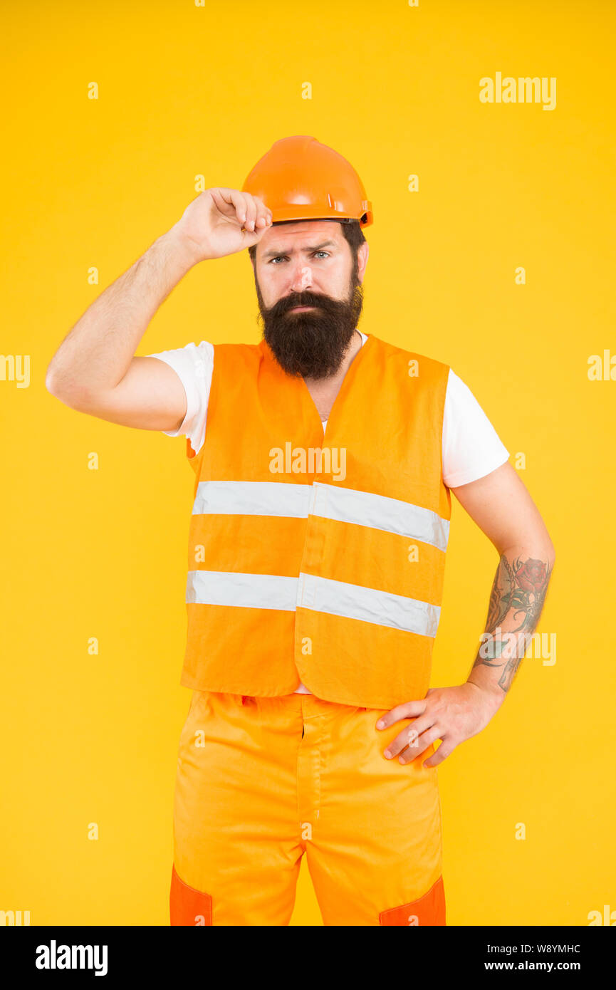 Labor day. Safety apparel for construction industry. Bearded brutal ...