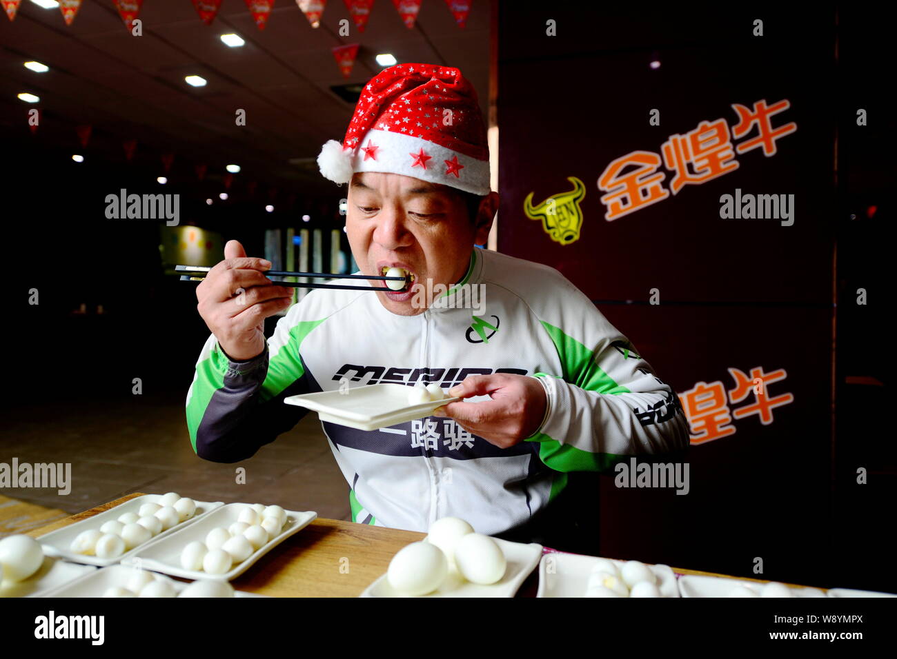 Chinese big eater Pan Yizhong eats eggs during a Christmas dinner ...
