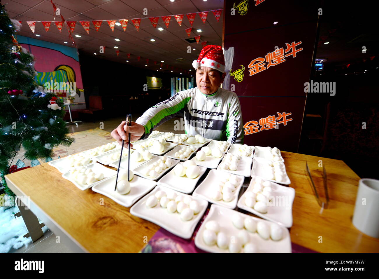 Chinese big eater Pan Yizhong eats eggs during a Christmas dinner ...