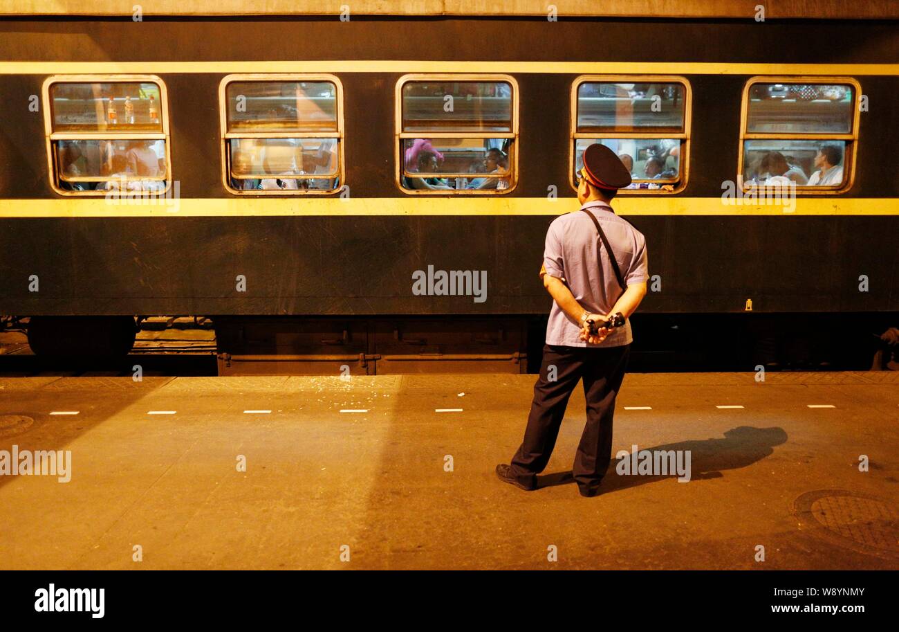 Chinese train conductor hi-res stock photography and images - Alamy