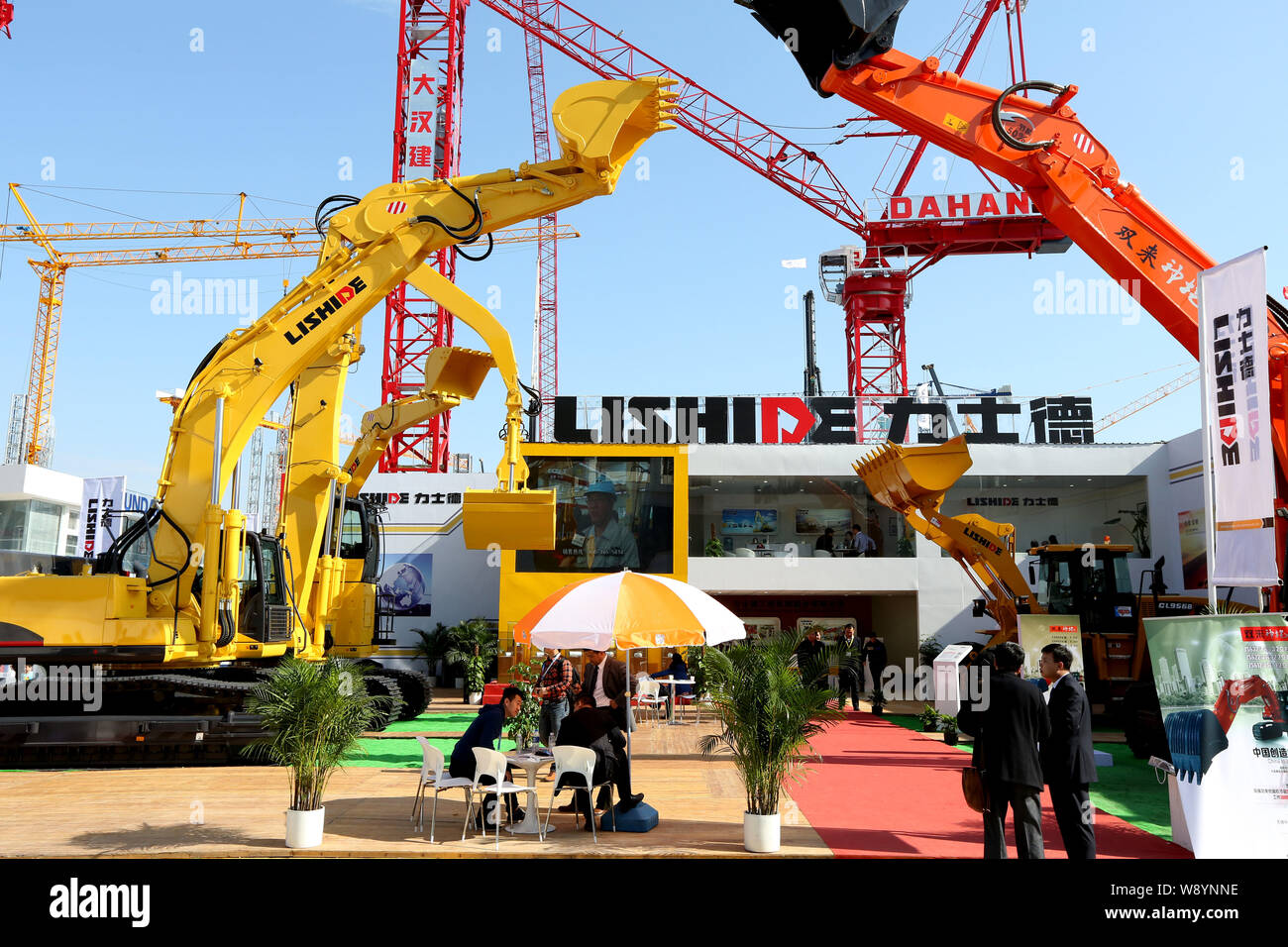 Excavators are displayed at the stand of Lishide during the 7th ...