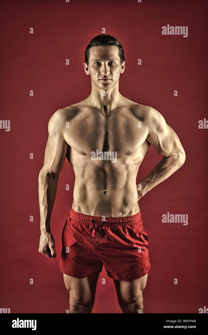 Attractive guy muscular chest. Proud of excellent shape. Healthy and ...