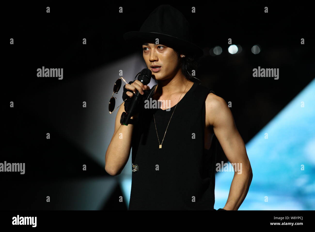 Japanese actor and singer Akanishi Jin speaks during the Shanghai West ...