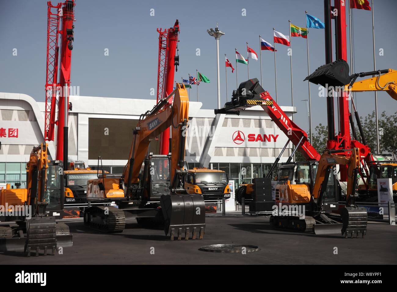 --FILE--Excavators of Sany Heavy Industry Co. are displayed during a ...