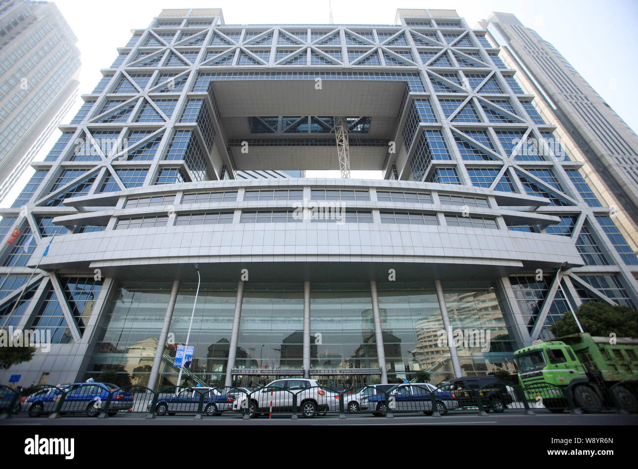 --FILE--Vehicles drive past the Shanghai Stock Exchange (SSE) Building ...