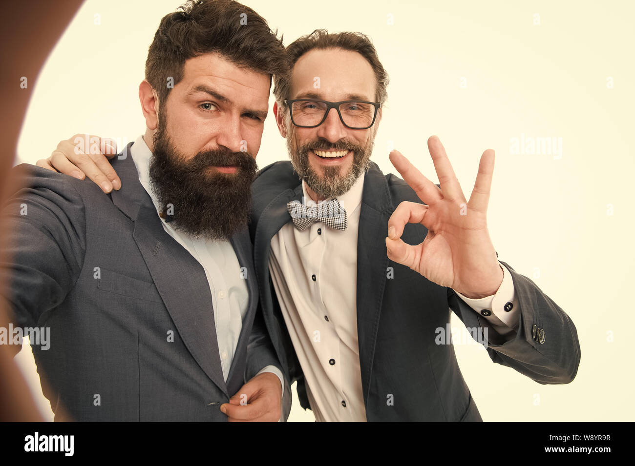 With good old friend. Men successful entrepreneurs on white background ...