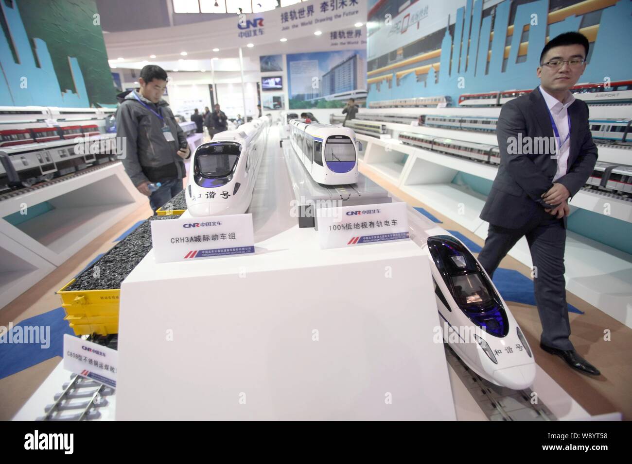 --FILE--Visitors look at models of CRH (China Railway High-speed ...