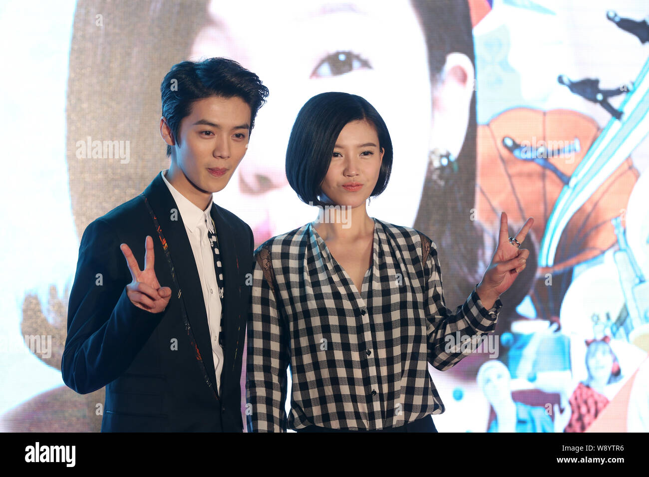 Chinese actress Yang Zishan, right, poses with Chinese actor and singer ...