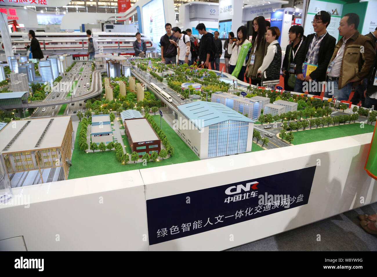 People visit the stand of CNR (China Northern Locomotive and Rolling ...