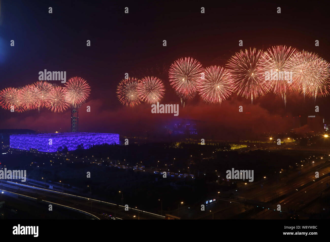 Fireworks explode over the National Stadium, also known as the Bird's ...