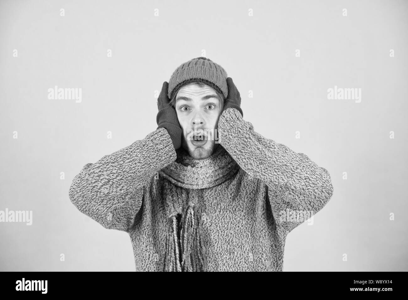 Its real scary. Man with scary face in cold sweat. Man wear winter ...