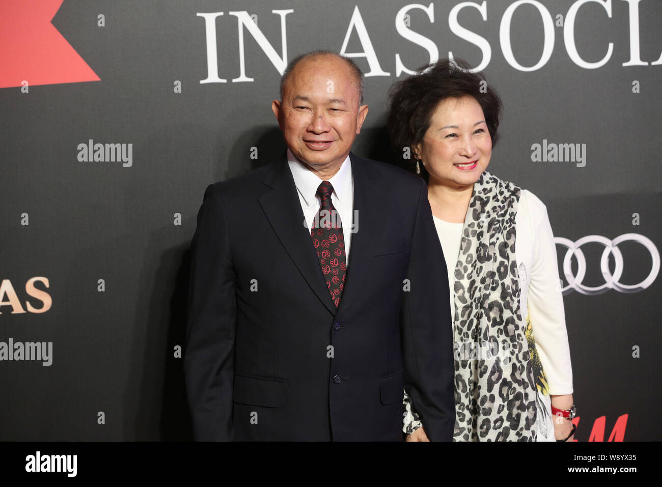 Hong Kong director John Woo, left, and his wife Annie Woo pose on the ...