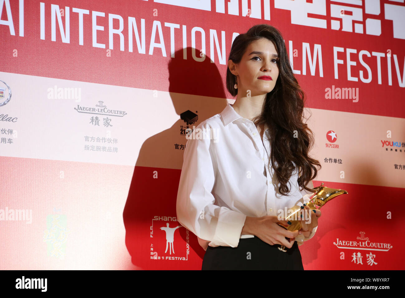 Greek actress Pinelopi Tsilika holds her trophy of the Best Actress ...