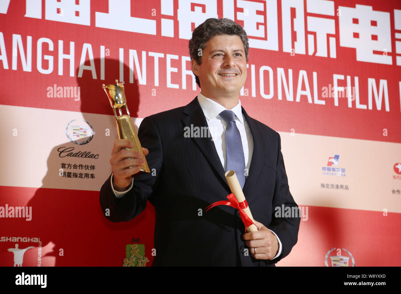 American singer-songwriter Gregg Alexander holds his trophy of the ...
