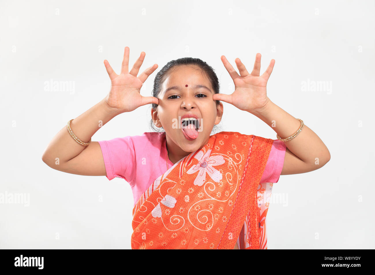 Girl making a funny face Stock Photo - Alamy