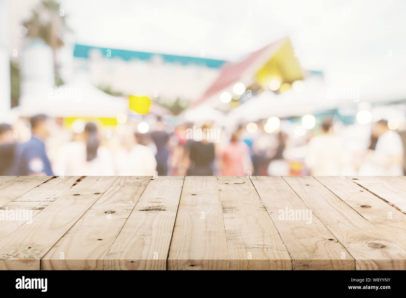 Empty wood table and Vintage tone blurred defocused of crowd people in ...