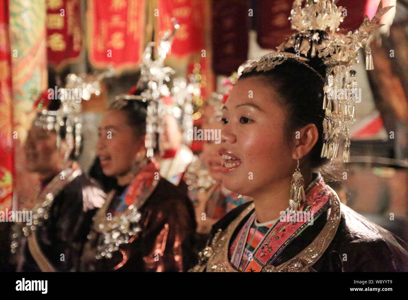 --FILE--Women of Dong ethnic minority sing at an event in Meilin ...