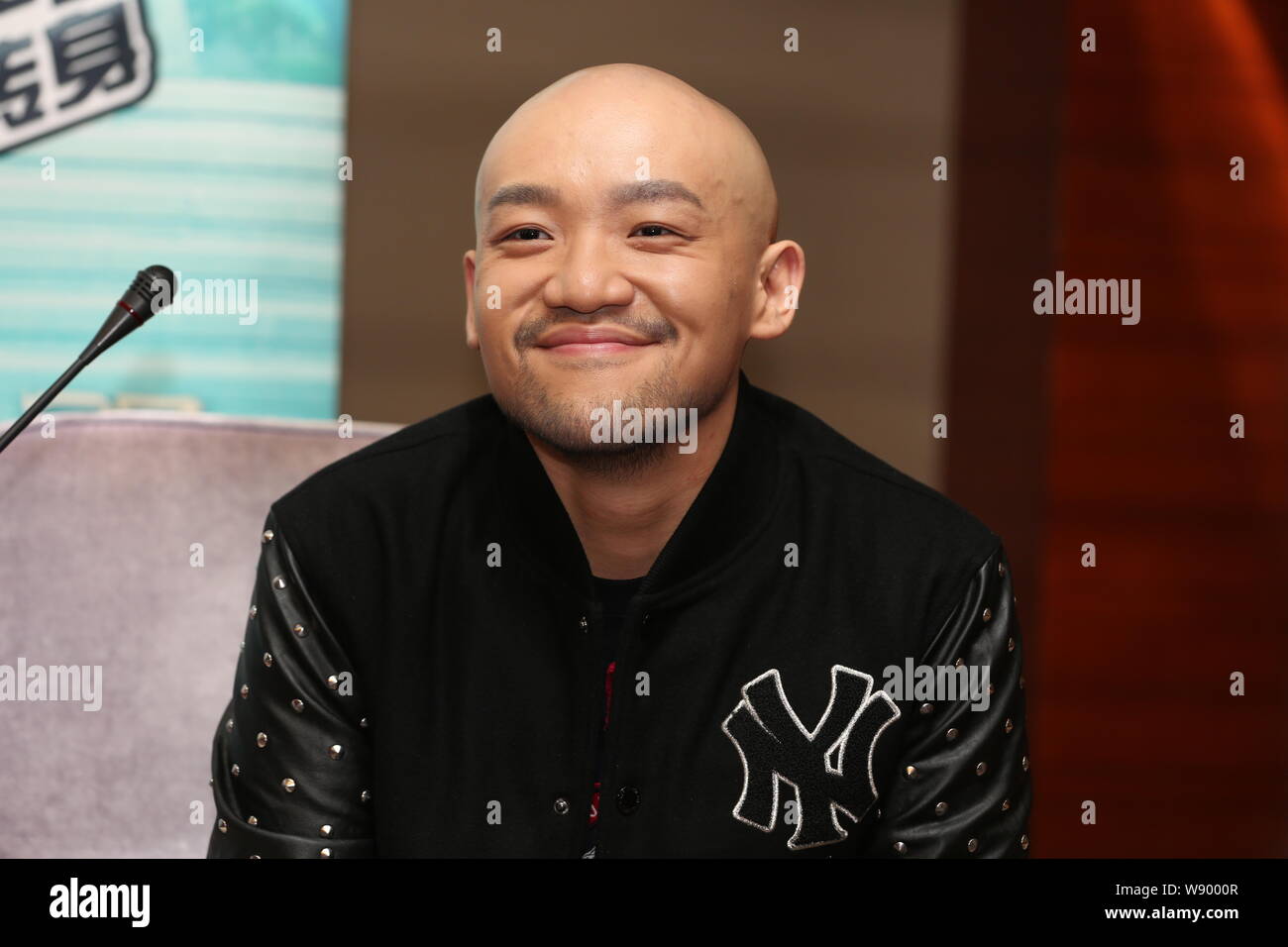 --FILE--Chinese singer Li Daimo smiles at a press conference for his ...