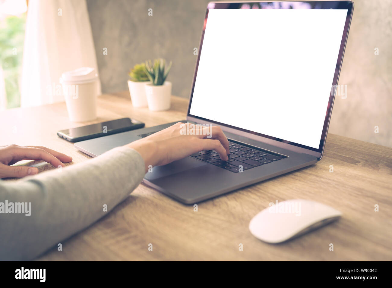 Business woman using laptop computer do online activity on wood table ...