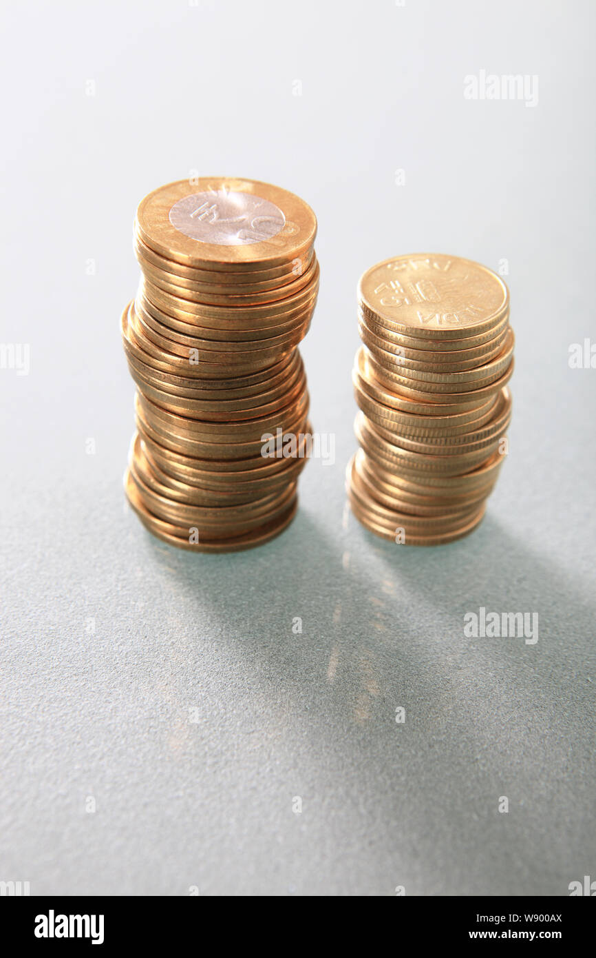 Stacks of Indian coins Stock Photo - Alamy