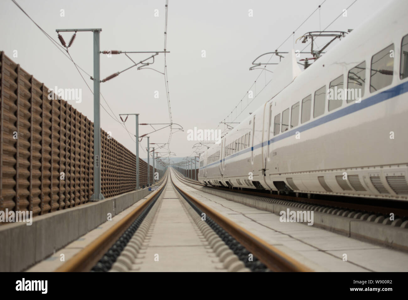 A CRH (China Railway High-speed) train travels on the Xinjiang Section ...
