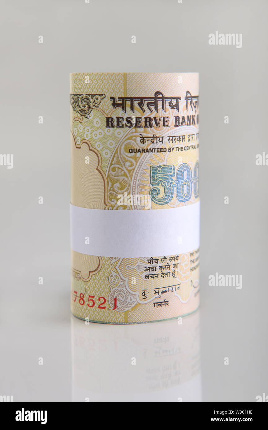Close up rolling banknotes hi-res stock photography and images - Alamy