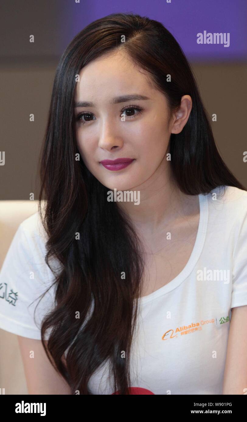 Chinese Actress Yang Mi Poses During A Press Conference After A Charity