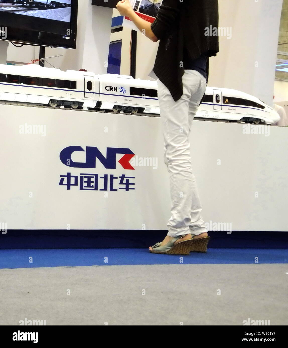 --FILE--A visitor is seen at the stand of CNR (China Northern ...