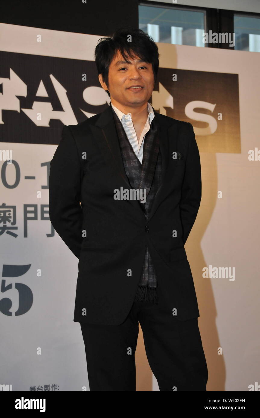 Japanese singer-songwriter Aska poses at a press conference for his ...