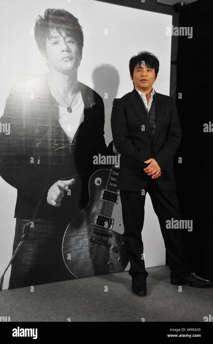 Japanese singer-songwriter Aska poses at a press conference for his ...