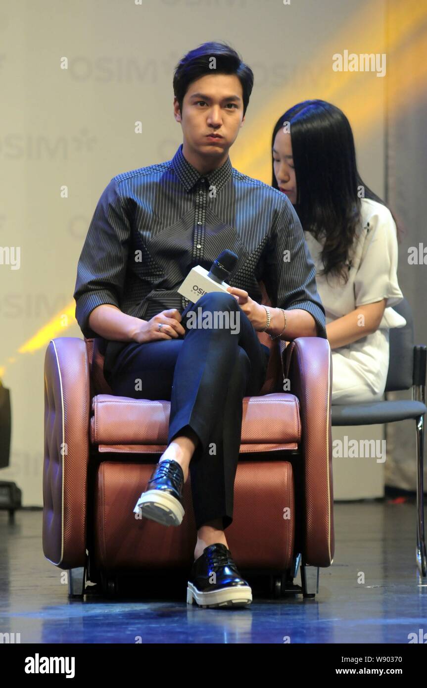 South Korean actor Lee Min-ho, front, listens to an interpreter during ...