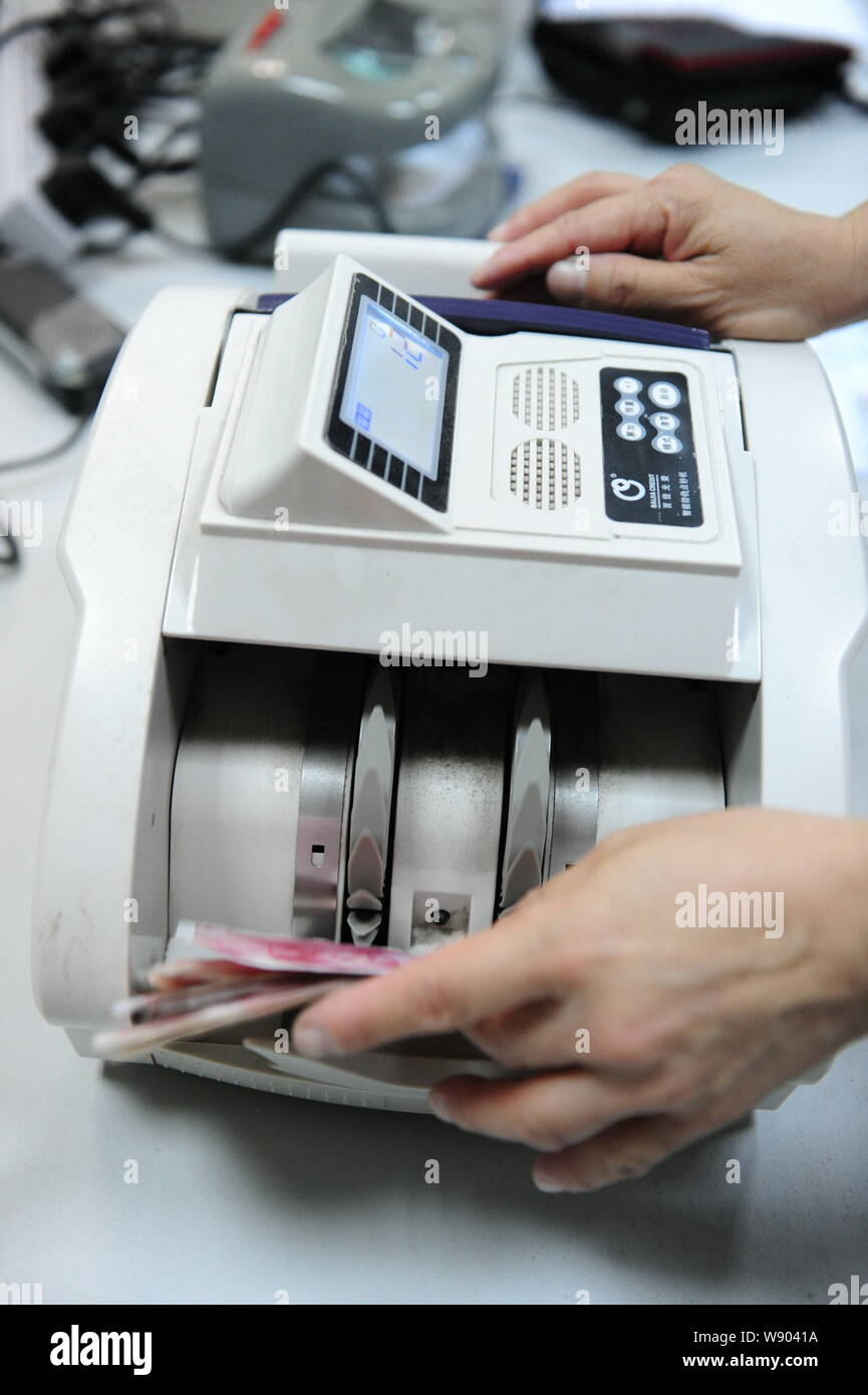 Bank note counting machine hi-res stock photography and images - Alamy