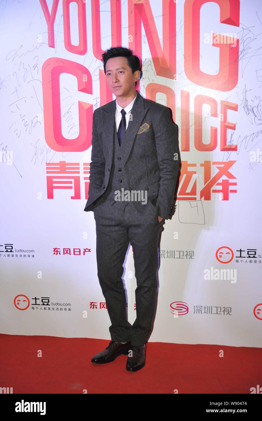 Chinese singer and actor Han Geng poses on the red carpet for the 2014 ...