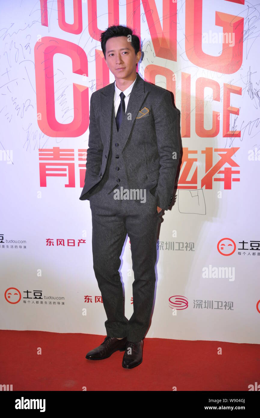 Chinese singer and actor Han Geng poses on the red carpet for the 2014 ...