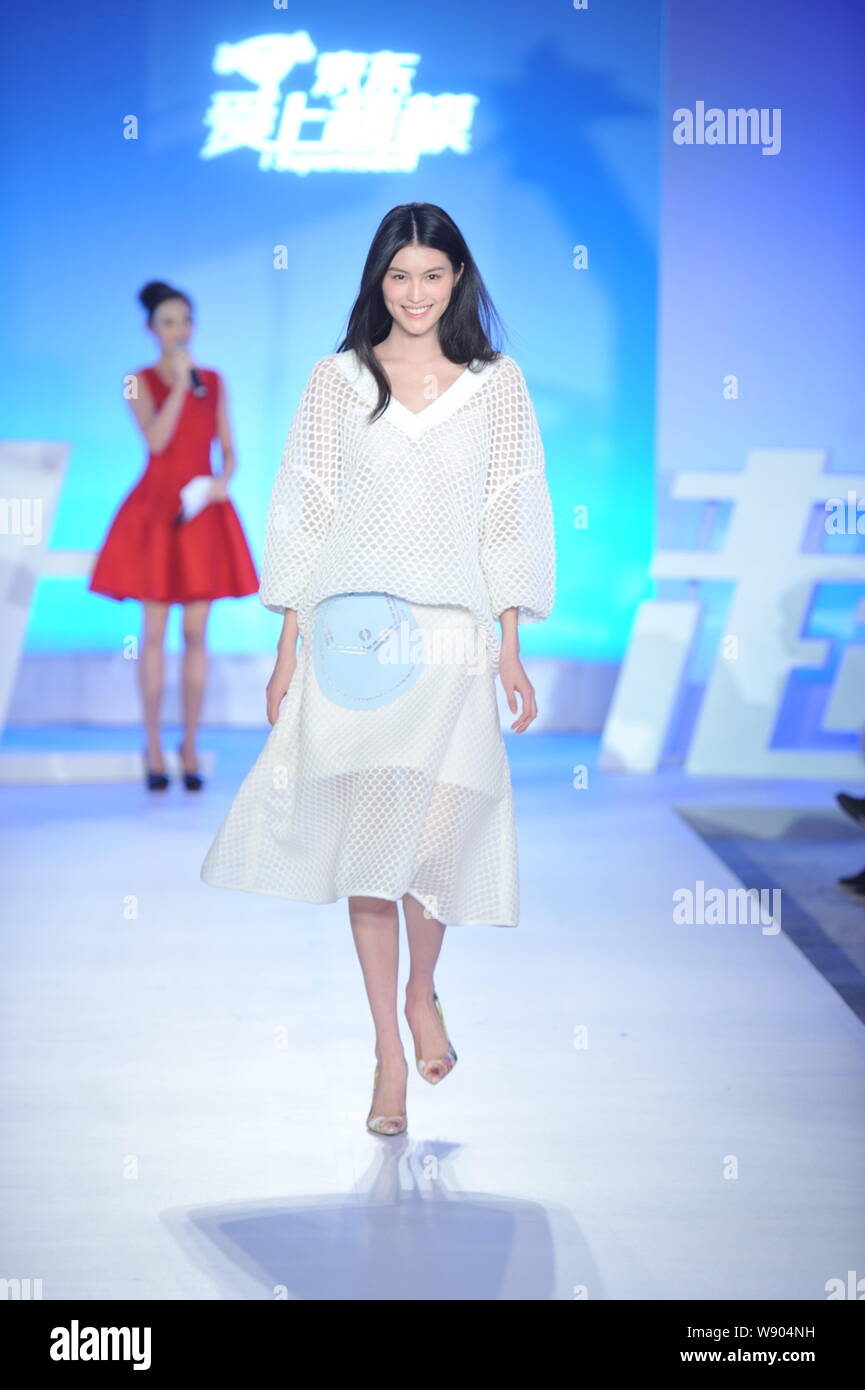 Chinese model He Sui displays a creation at a fashion show for the ...