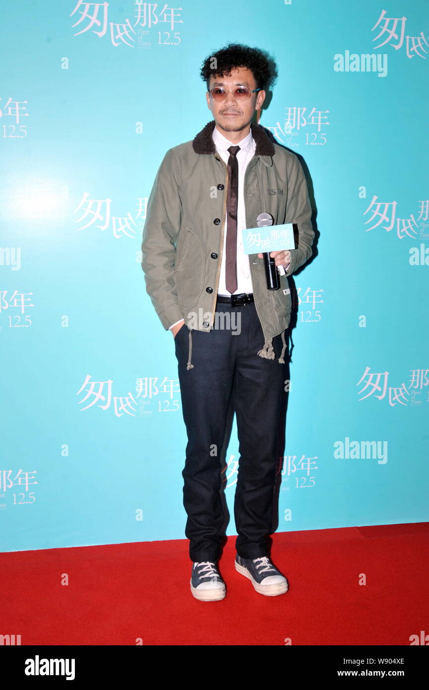 Chinese actor Wang Xuebin poses on the red carpet as he arrives for the ...