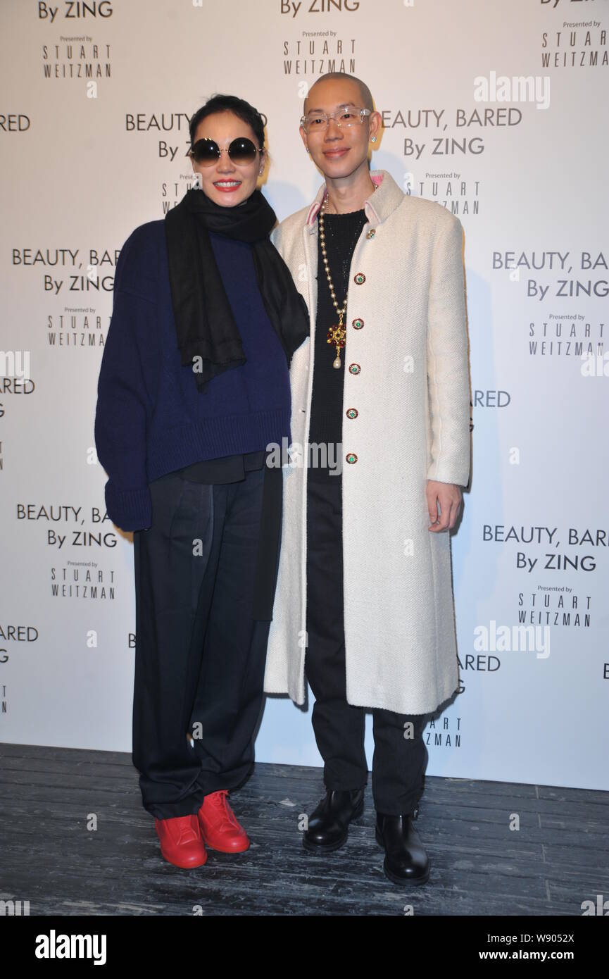 Hong Kong Singer Faye Wong Left And Her Image Designer Zing Pose During The Beauty And Bared