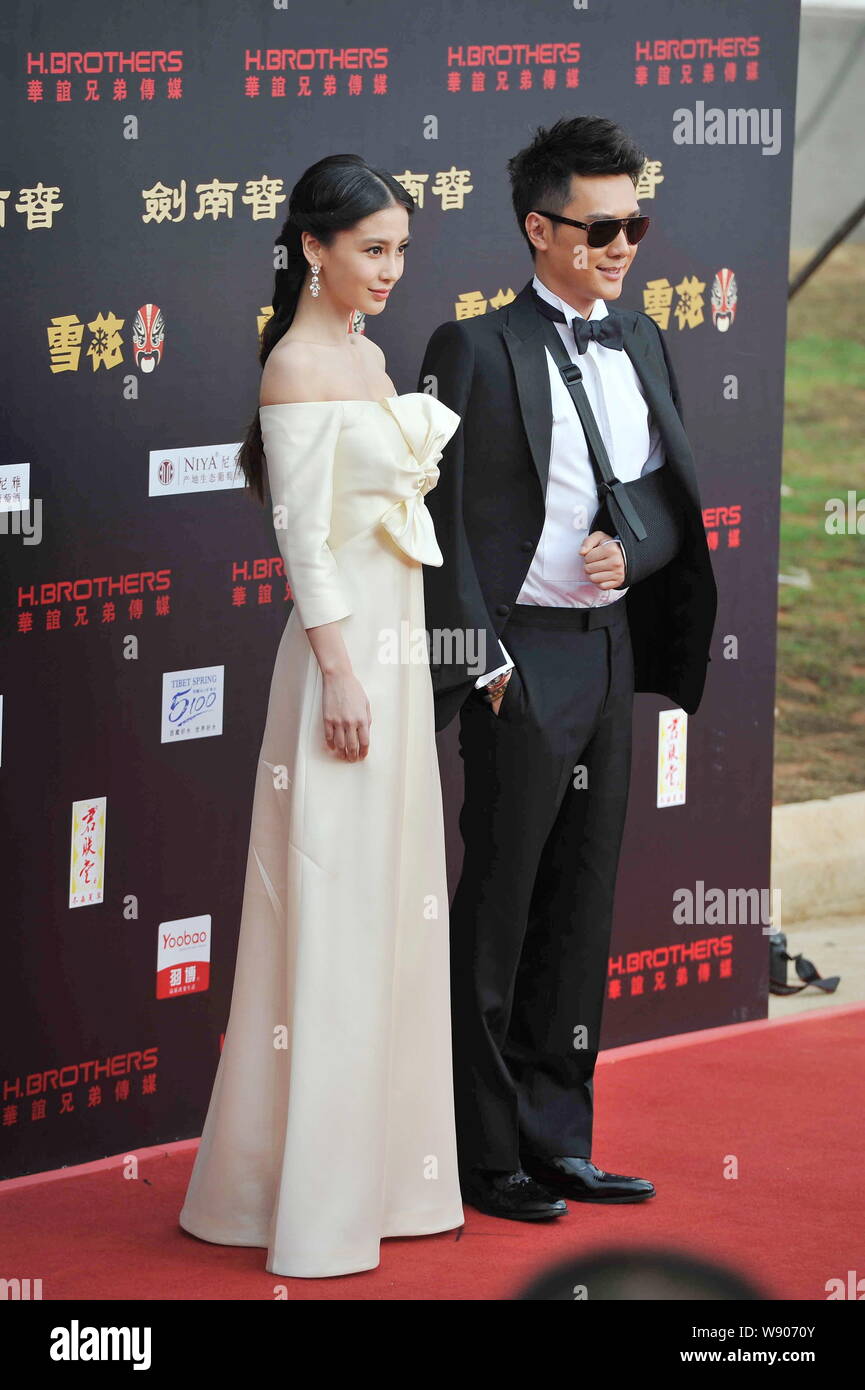 Hong Kong model and actress Angelababy, left, Chinese actor Feng ...