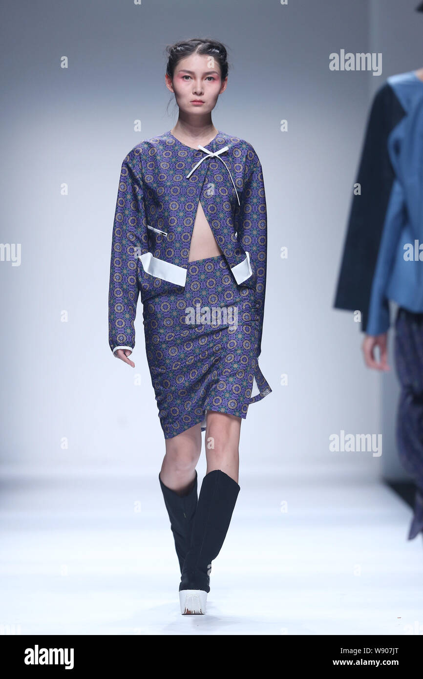 A model displays a new creation at the Moodbox fashion show during the ...
