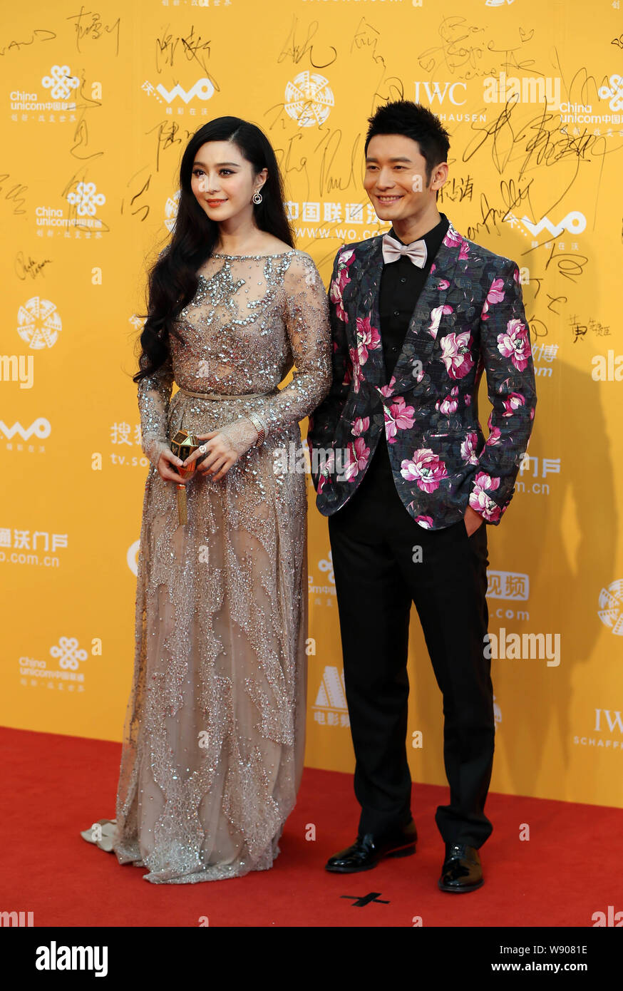 Chinese actress Fan Bingbing, left, and actor Huang Xiaoming pose on ...