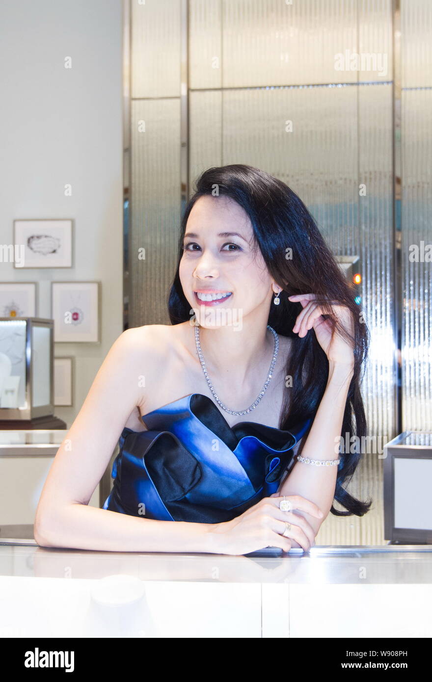 Hong Kong singer and actress Karen Mok poses during the opening ...