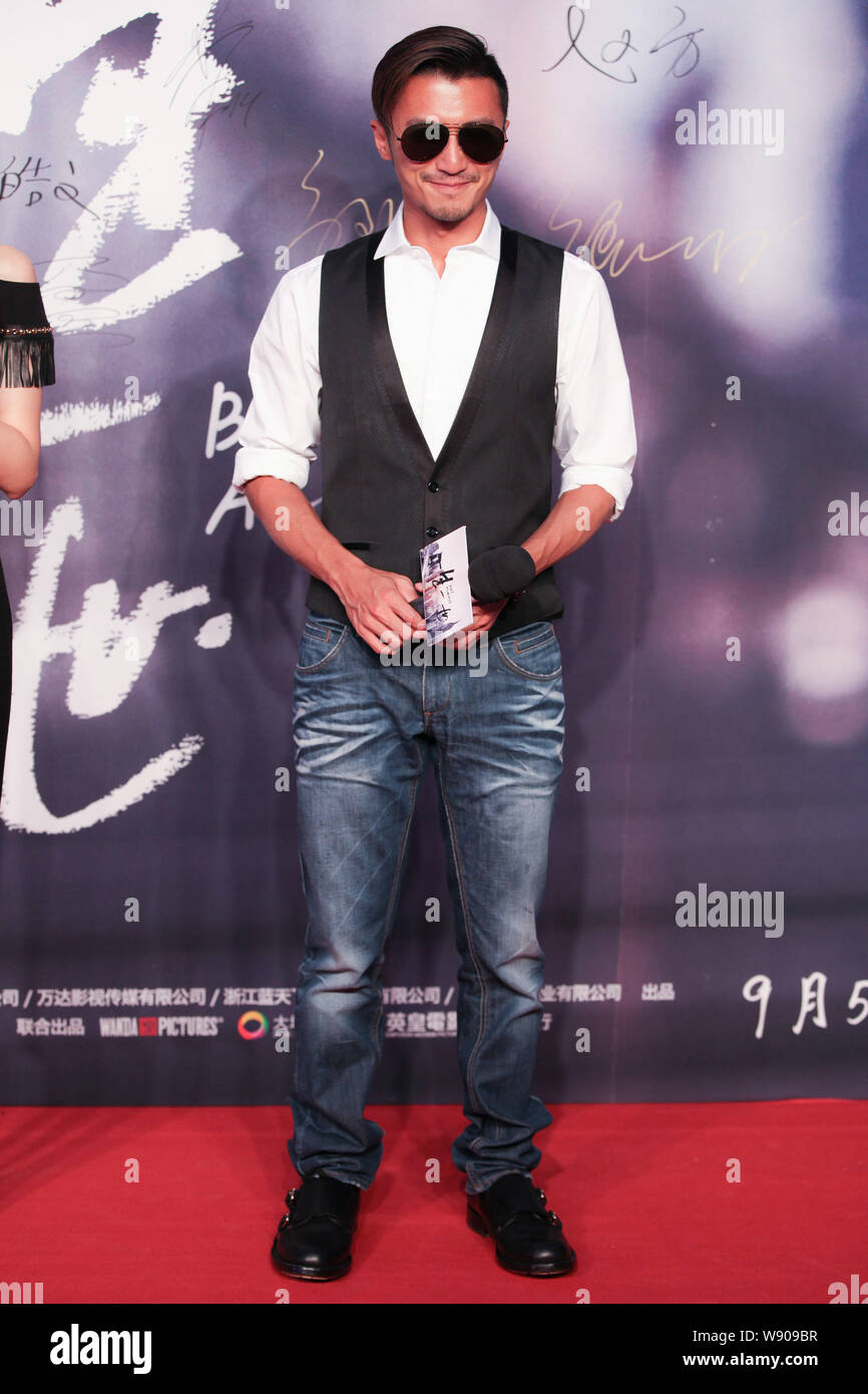 Hong Kong actor Nicholas Tse poses on the red carpet for the premiere ...