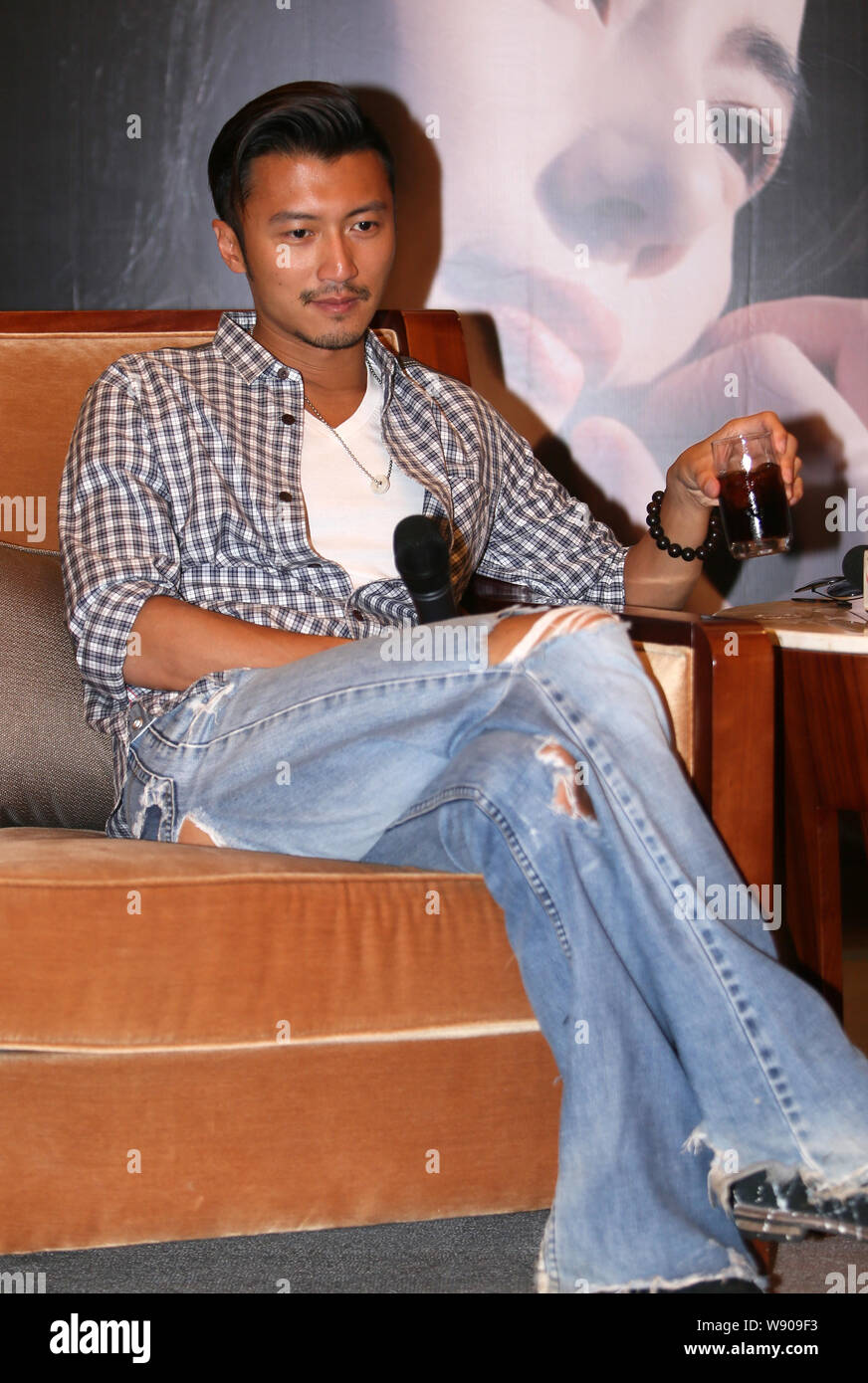 Hong Kong singer and actor Nicholas Tse poses at a press conference of ...