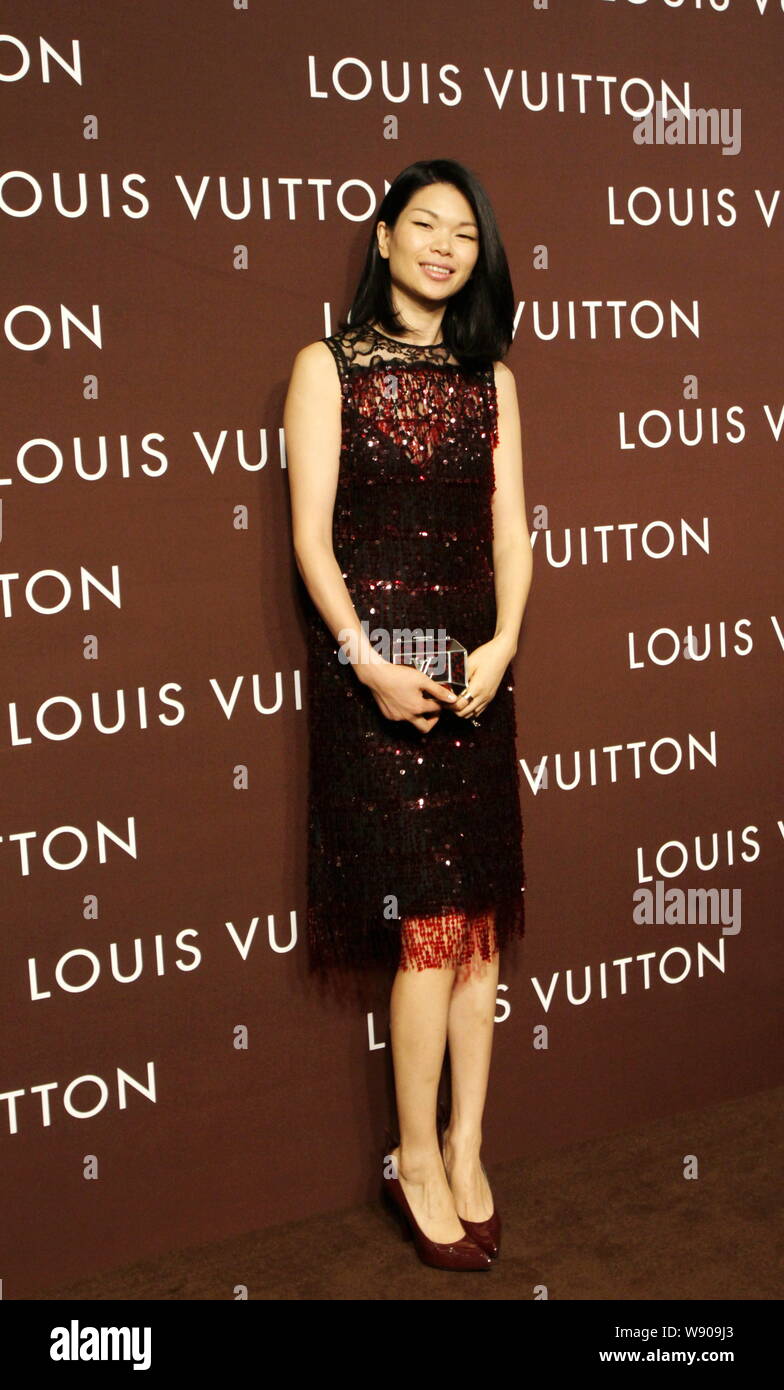 Chinese model Lv Yan poses as she arrives at the opening ceremony for a ...