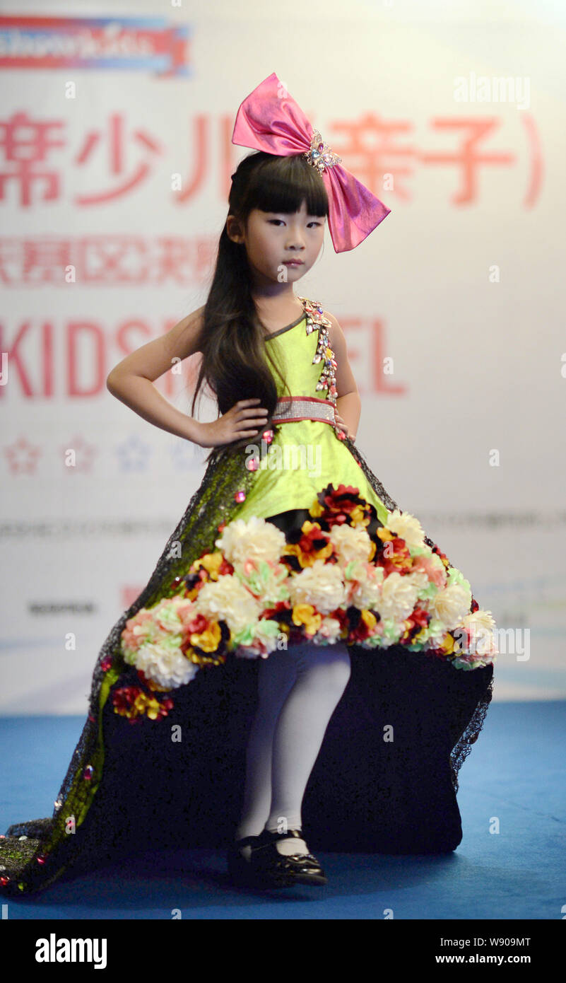 6-year-old Chinese child model Zhou Ziling parades during a competition ...