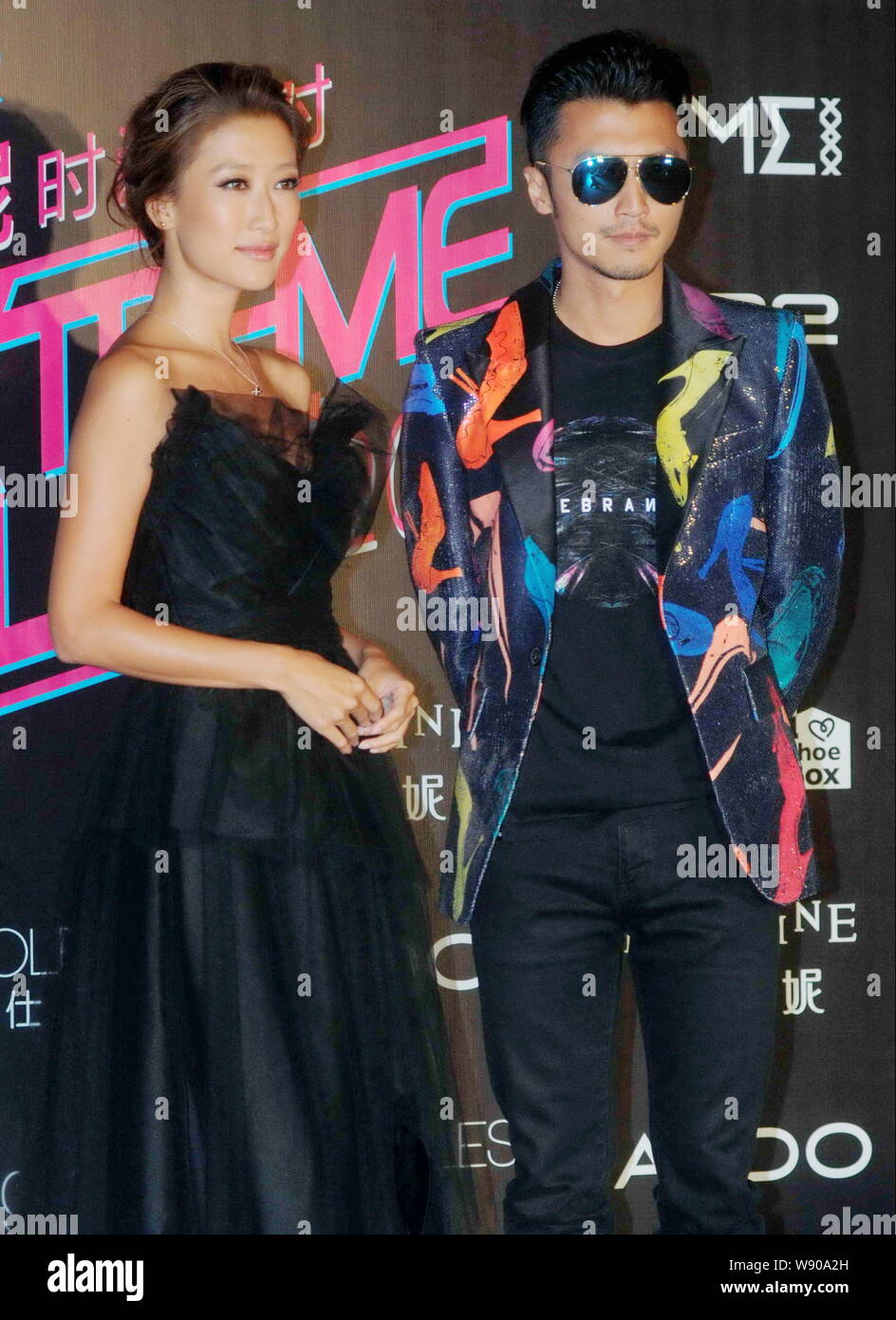 Hong Kong singer and actor Nicholas Tse, right, and his sister Jennifer ...