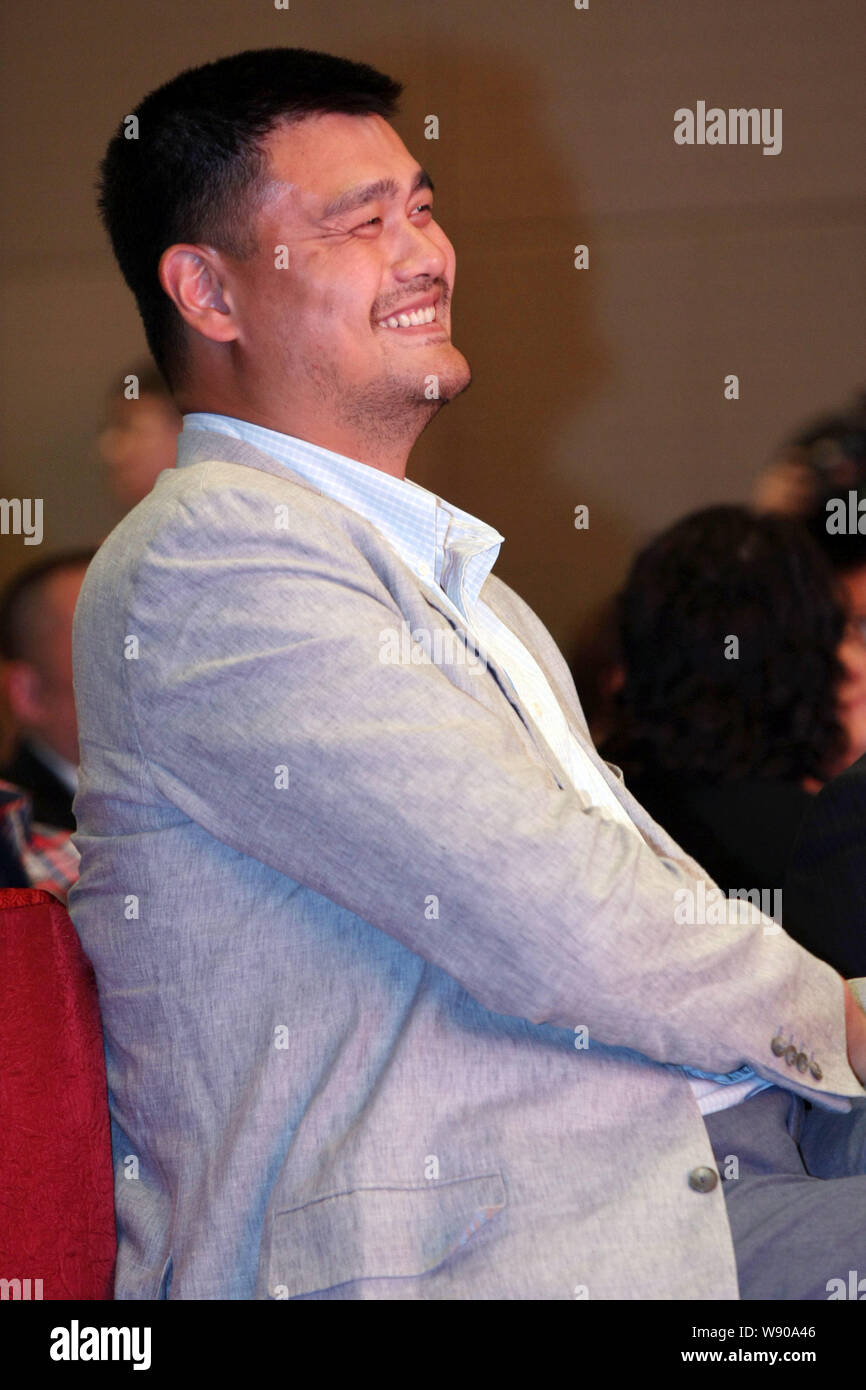 Former NBA basketball player Yao Ming smiles during a ceremony for ...