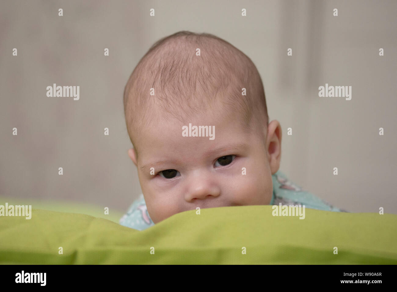 Baby girl hiding face behind hi-res stock photography and images - Alamy